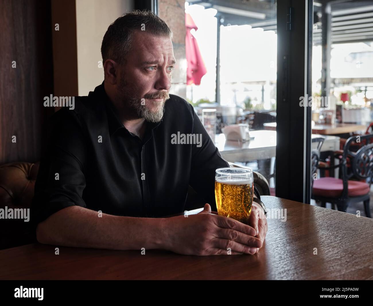 Person lonely at bar hi-res stock photography and images - Alamy