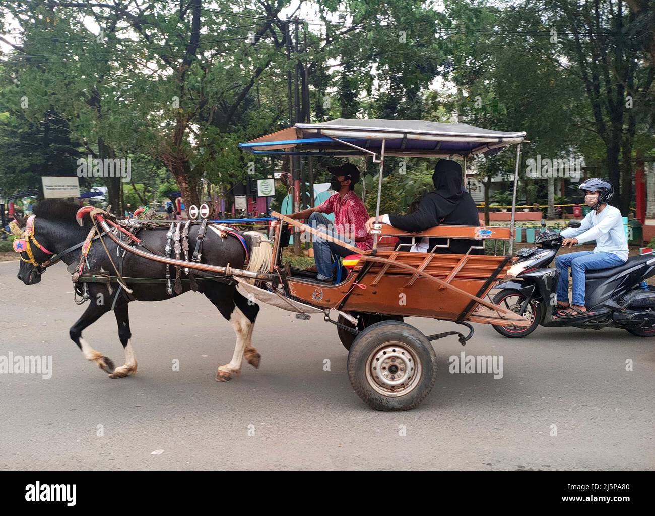 Jakarta, Indonesia-August 10, 2022: A dokar or andong is a kind of ...