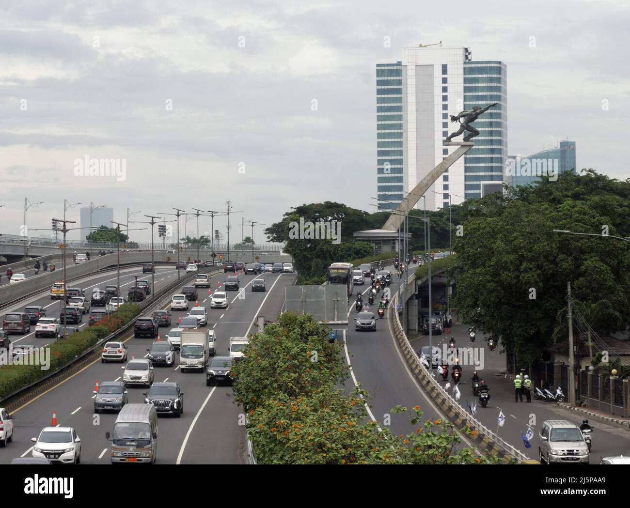 Jakarta, Indonesia-April 24, 2022: The pancoran statue with the sky ...