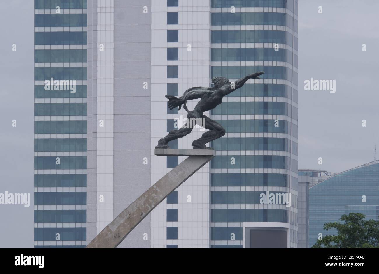Jakarta, Indonesia-April 24, 2022: The pancoran statue with the sky ...