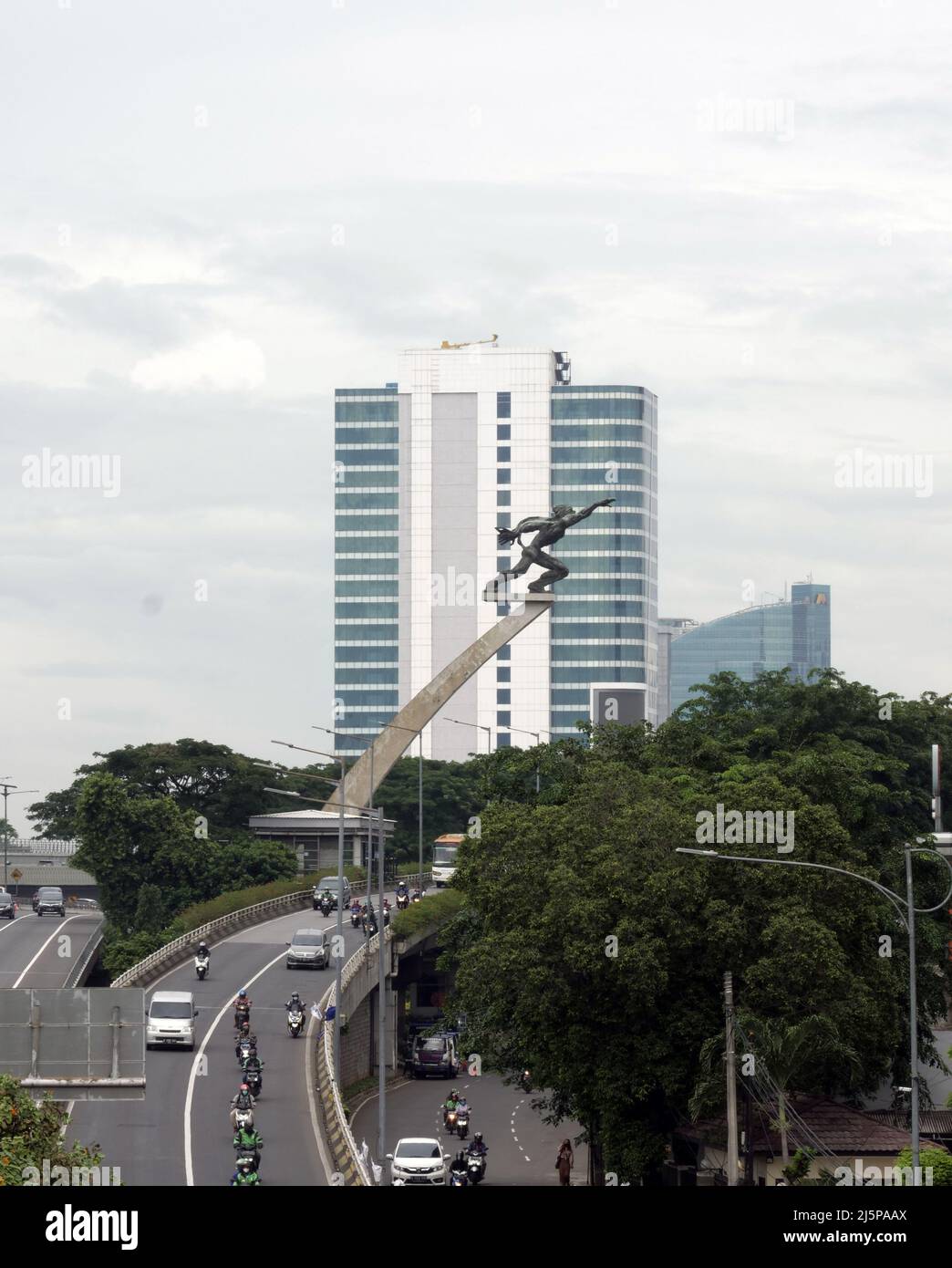 Jakarta, Indonesia-April 24, 2022: The pancoran statue with the sky ...
