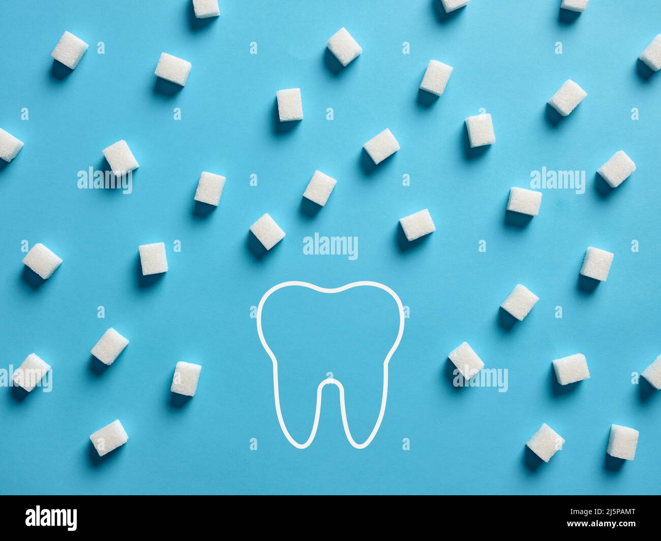 Tooth symbol with sugar cubes falling down. Dental care and tooth decay ...