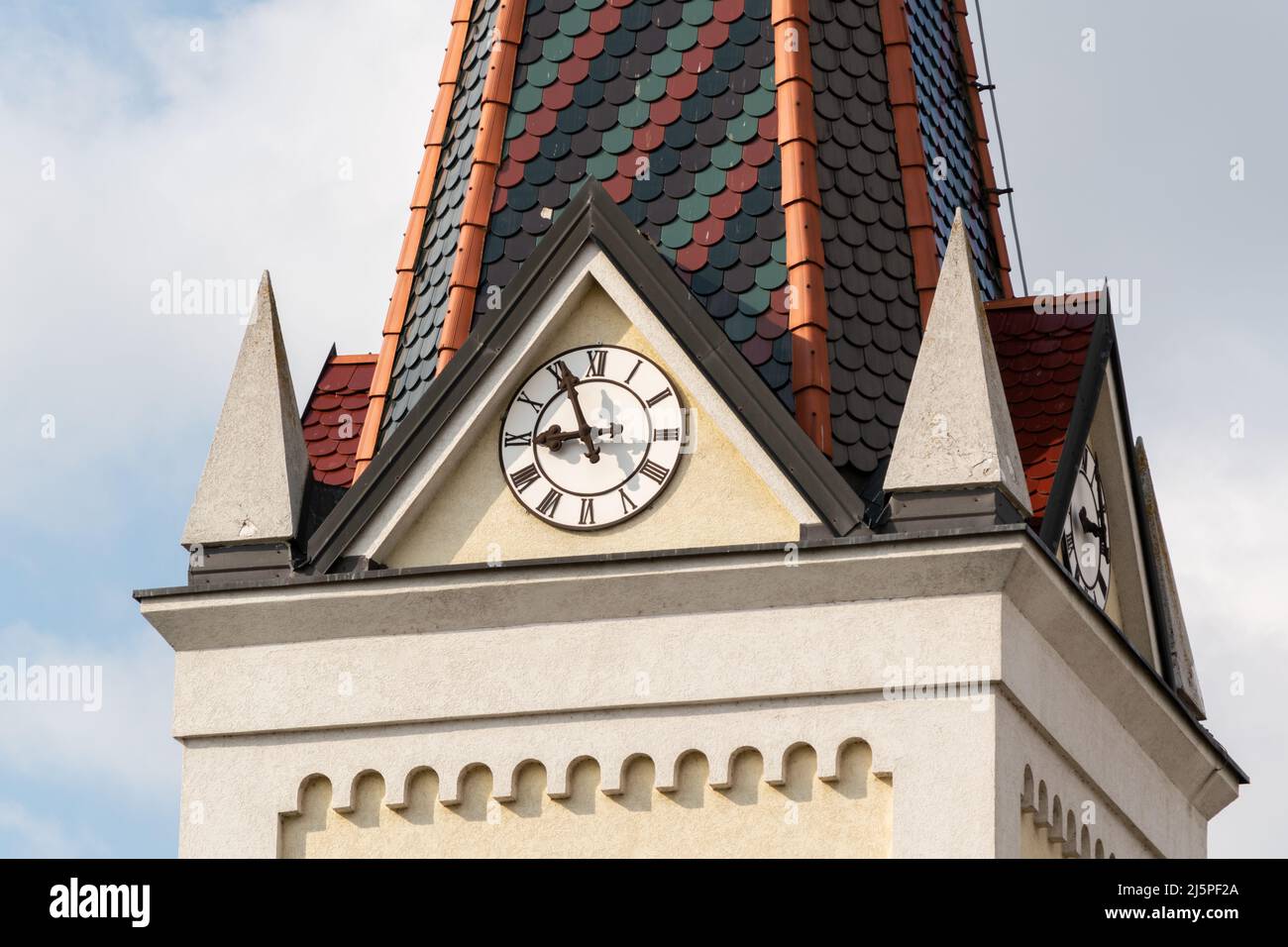 Clock on bell tower in close up, blue sky with cumulus clouds Stock ...