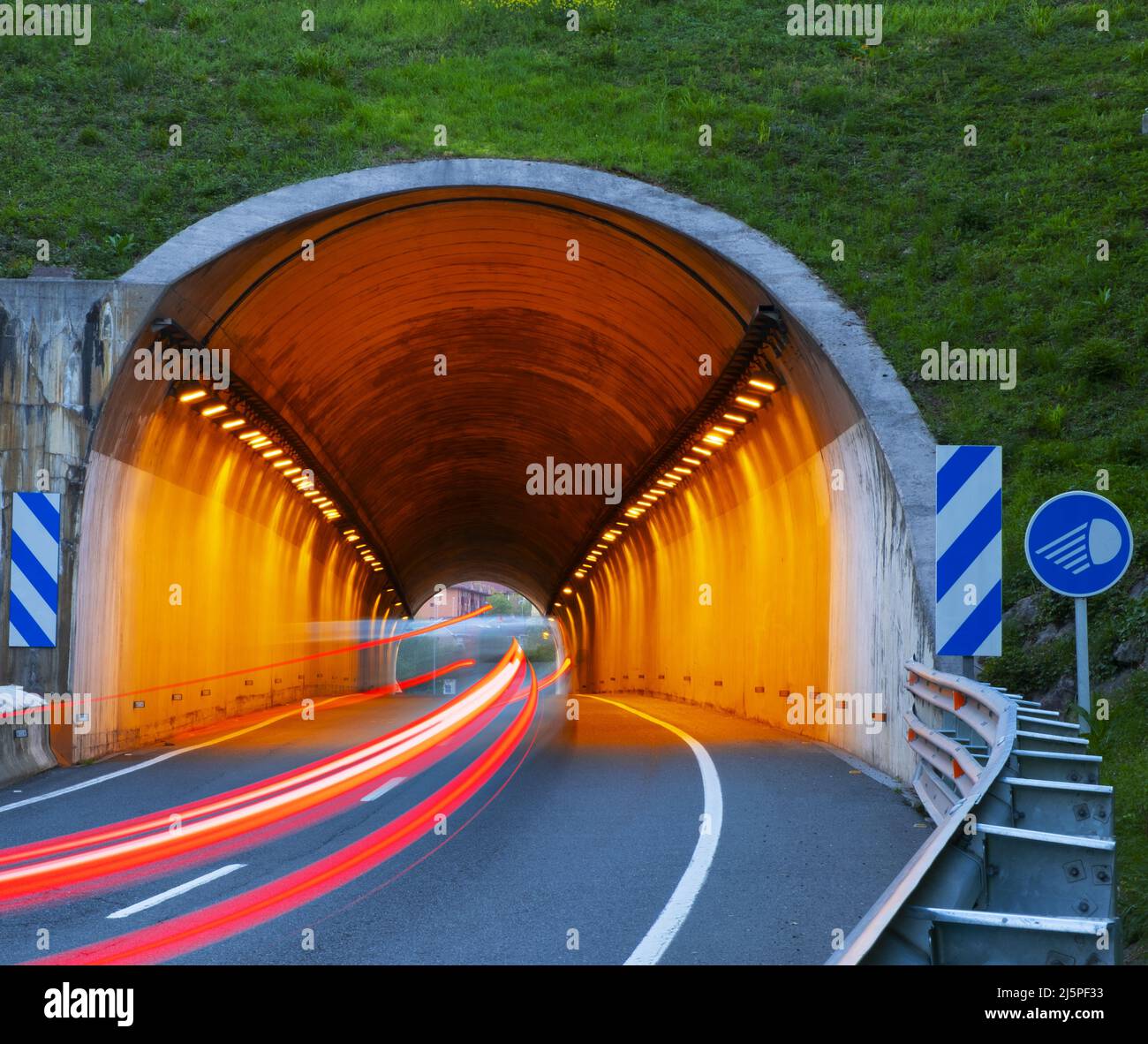 car driving at high speed through a tunnel Stock Photo - Alamy