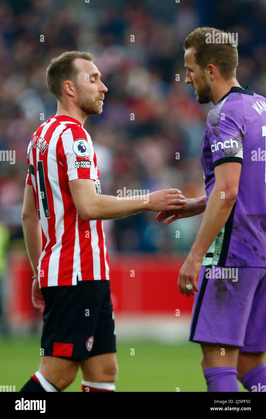 London, England - APRIL 23: L-R Christian Eriksen of Brentford shanks ...