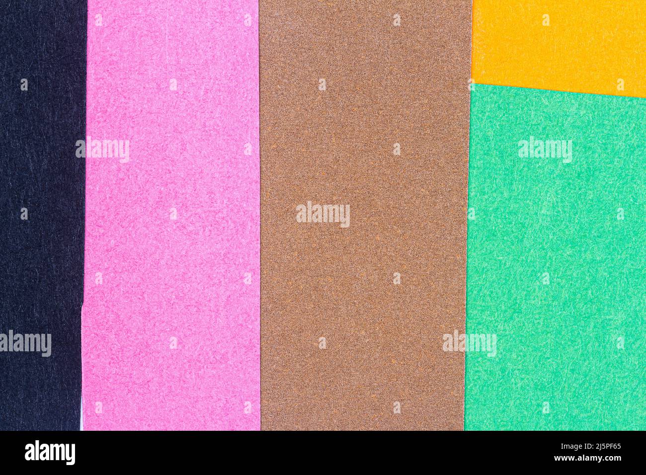 Multicolored background from a paper of different colors. Abstract ...