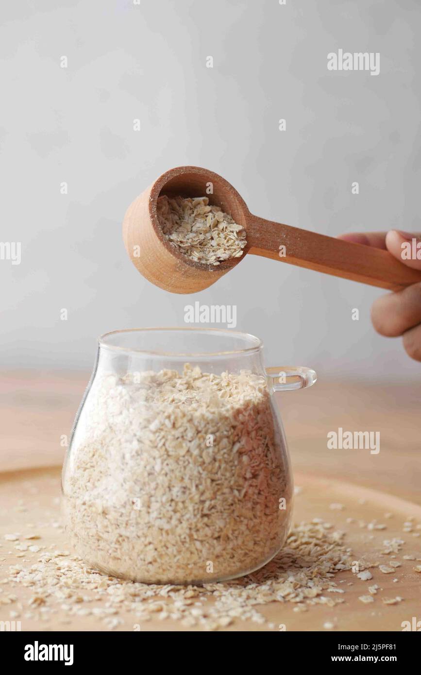 Close up oats flakes pouring hi-res stock photography and images - Alamy