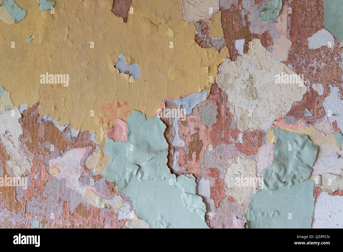 Multiple old paint layers in various colors on wall, weathered wall ...