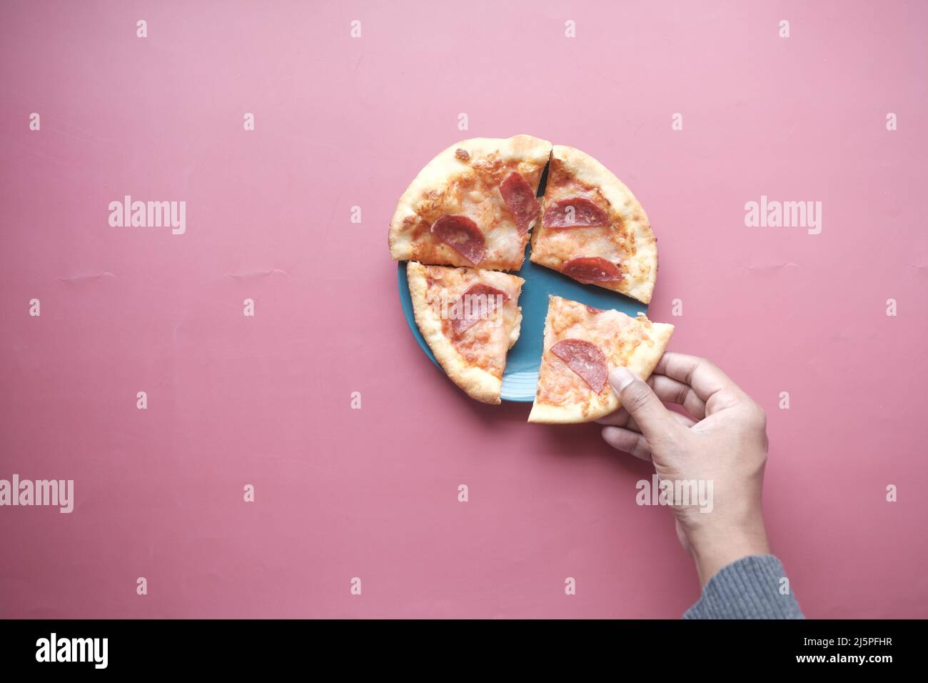 Top view hand pick red hi-res stock photography and images - Alamy