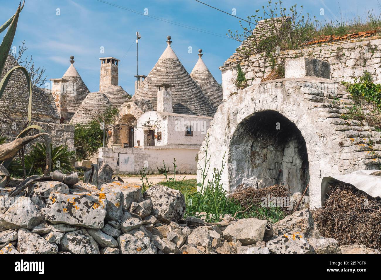 Group of Trulli or Trullo house, traditional Apulian dry stone hut with ...