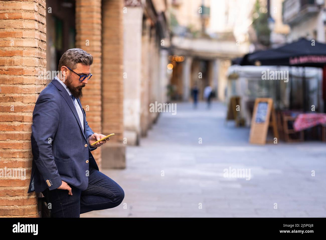 Businessmen in street using hi-res stock photography and images - Alamy