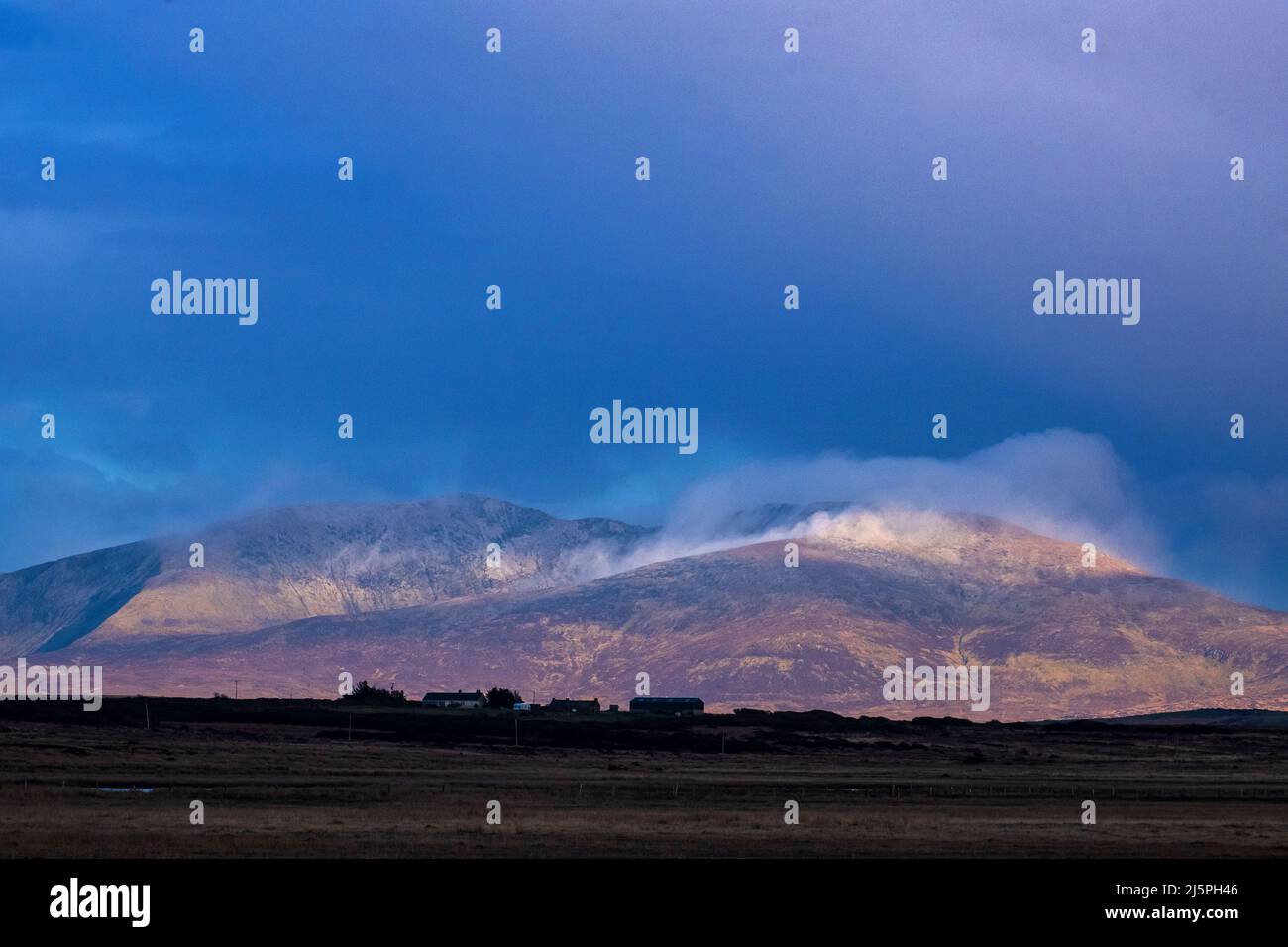 A snow-covered peak in Ballycroy National Park, County Mayo, Ireland ...