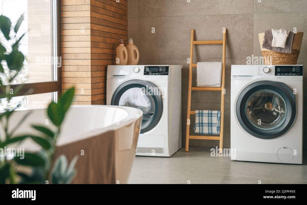Interior of a real laundry room with a washing machine at home Stock ...