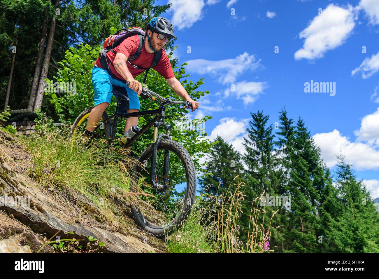 Downhill cyclist hi-res stock photography and images - Alamy
