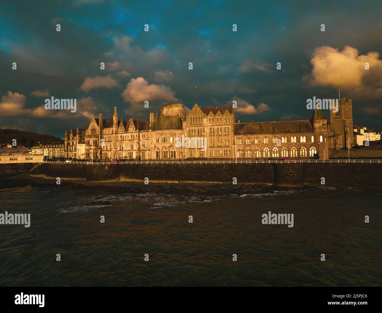 Sunset at the Old College in Aberystwyth, mid Wales Stock Photo - Alamy