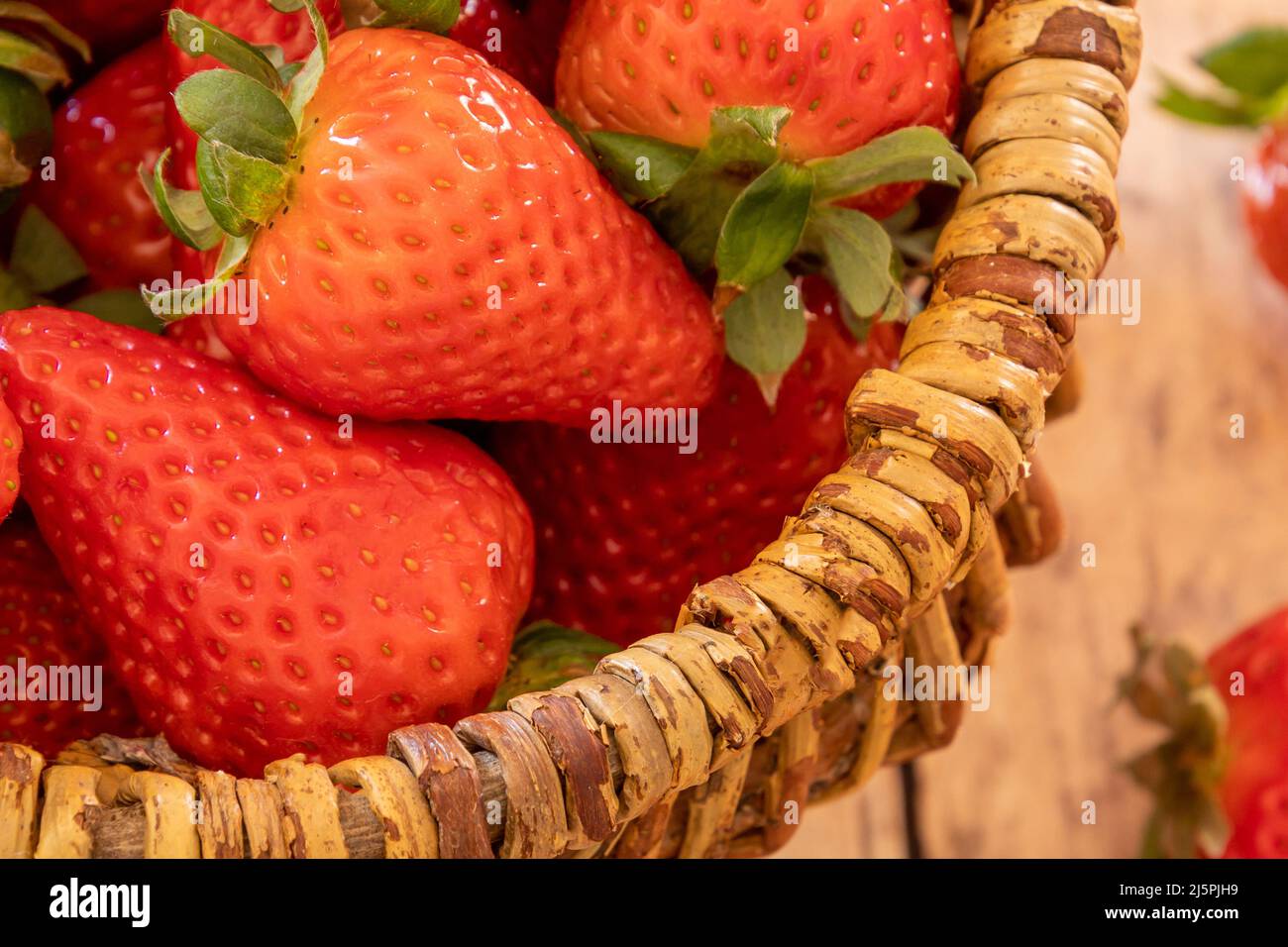close-up of ripe strawberries in a basket Stock Photo - Alamy