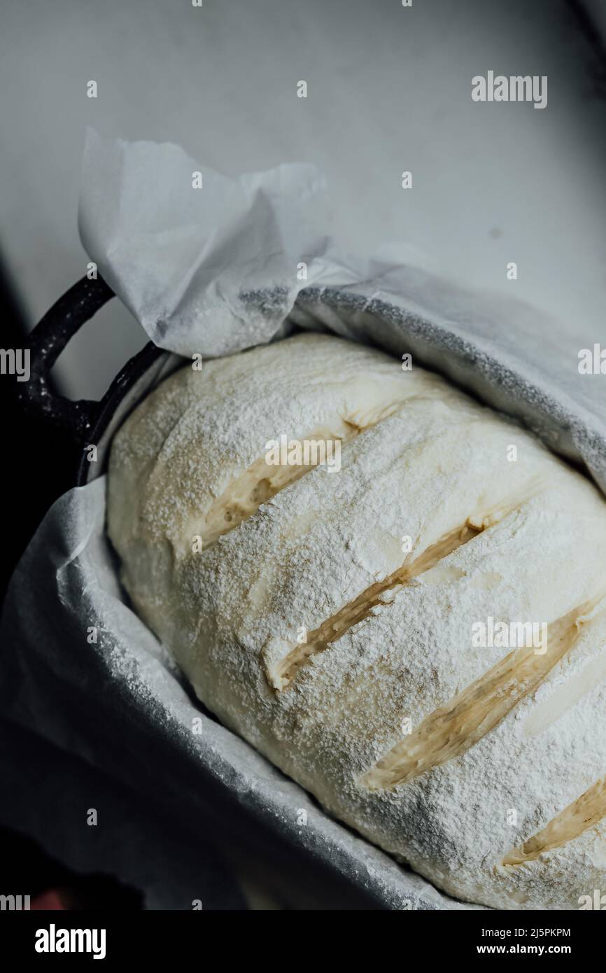 Raw bread dough in the mold ready for baking Stock Photo - Alamy