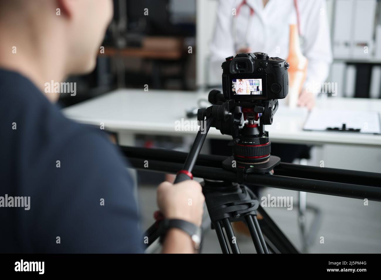 Female doctor recording vlog video about medicine and health care Stock ...