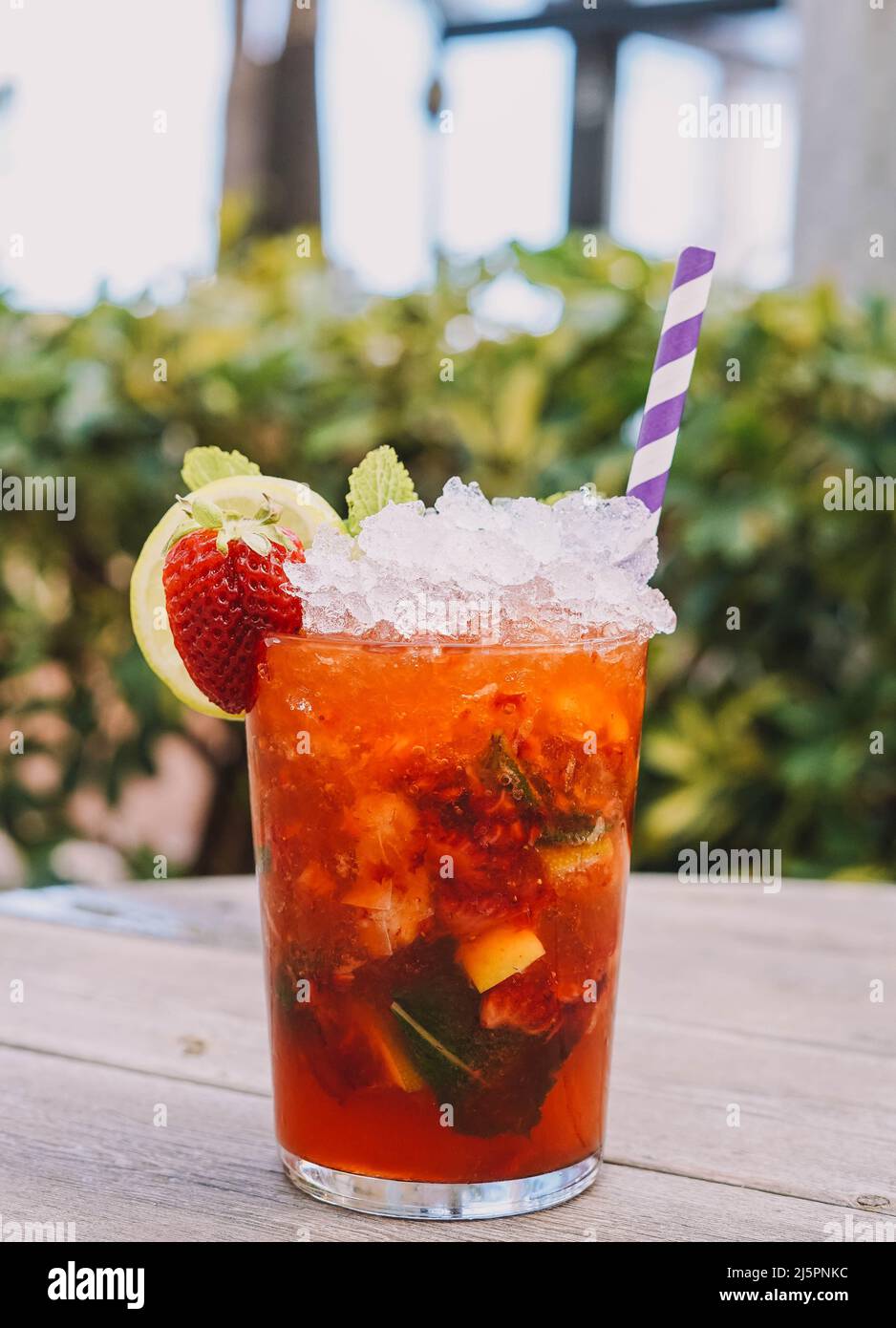 tropical cocktail of alcohol and natural juices Stock Photo - Alamy