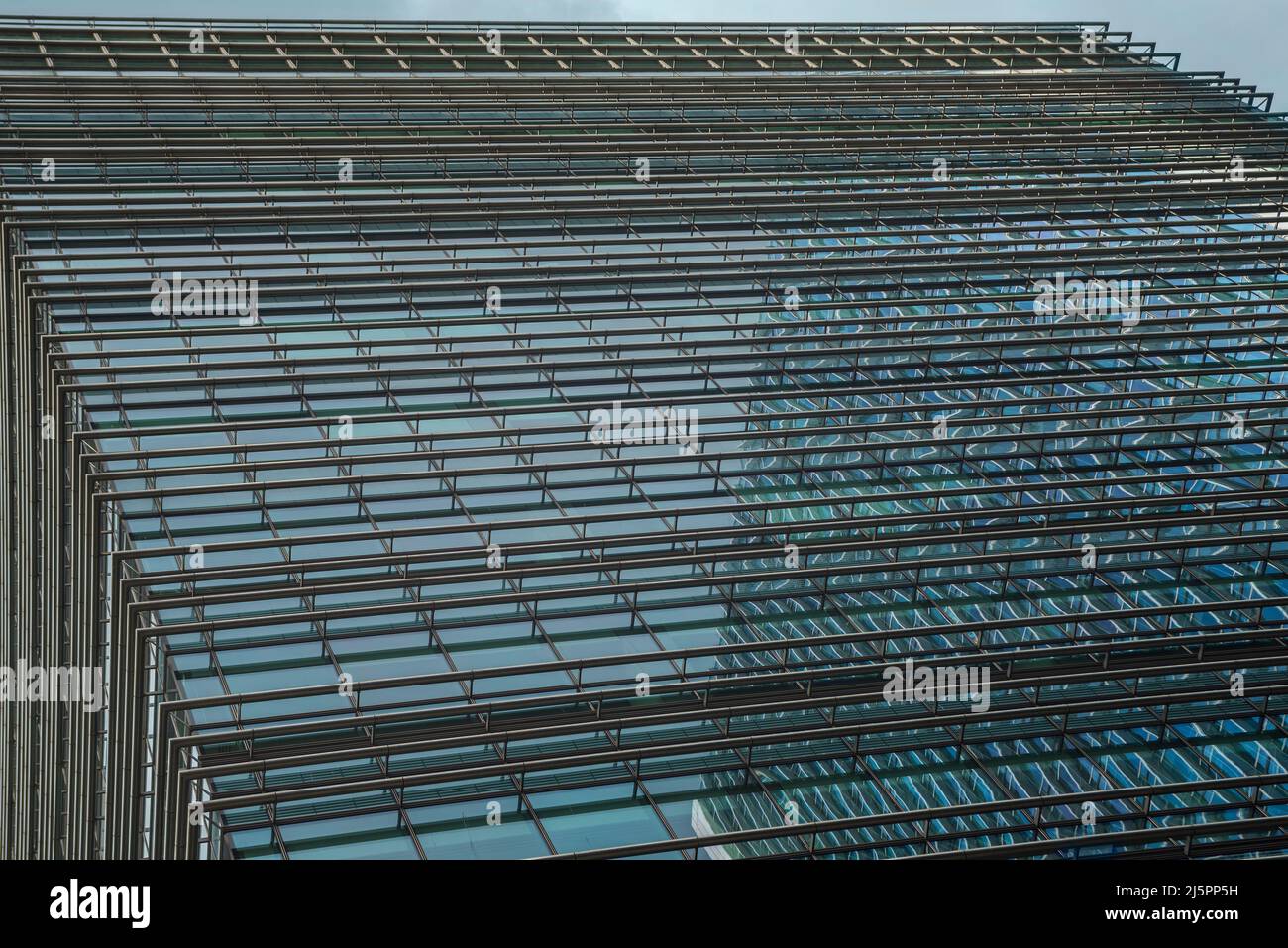 Tower block in a modern business development with exterior metal work ...