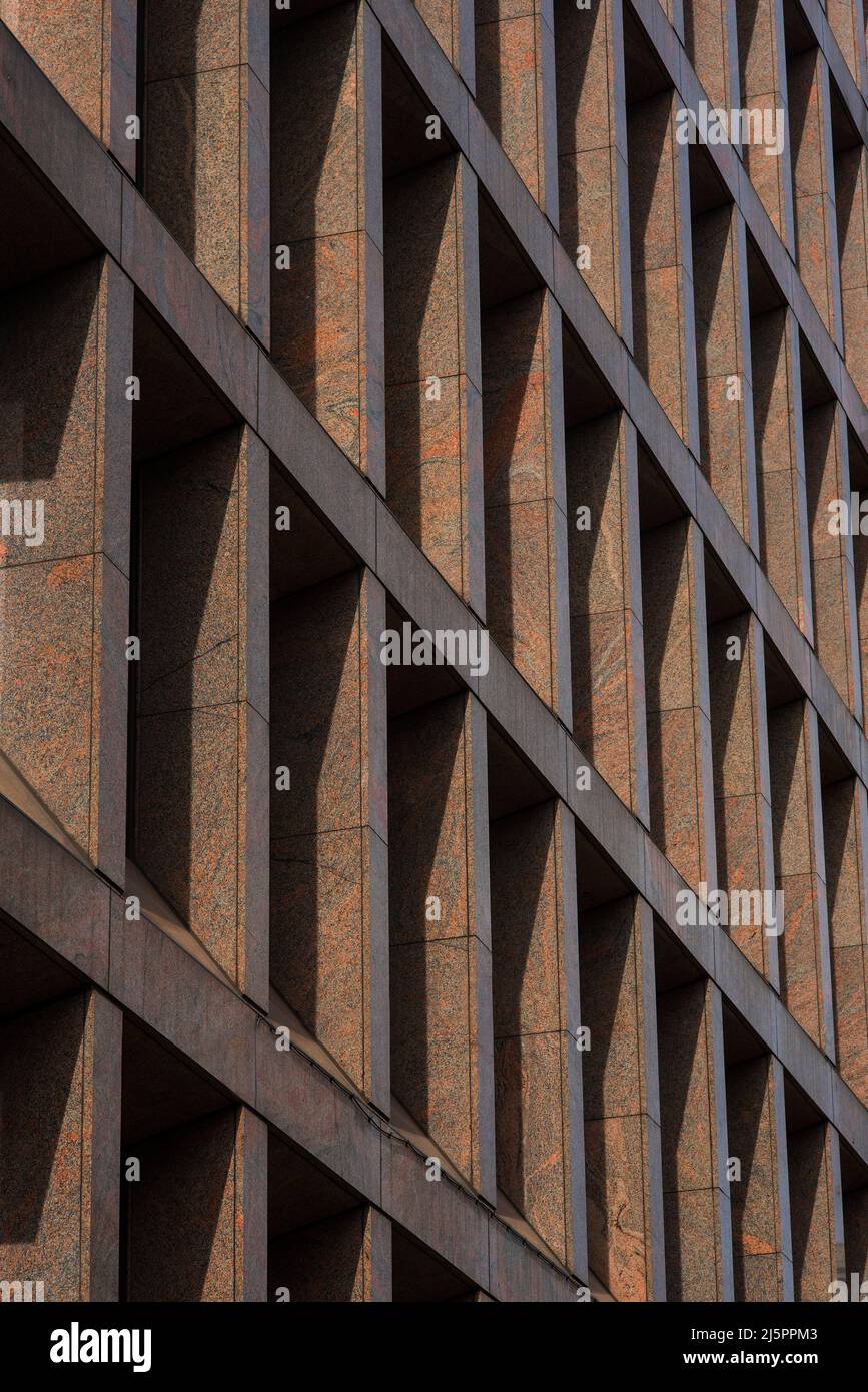 Pink granite clad tower block in a modern business development. Central ...