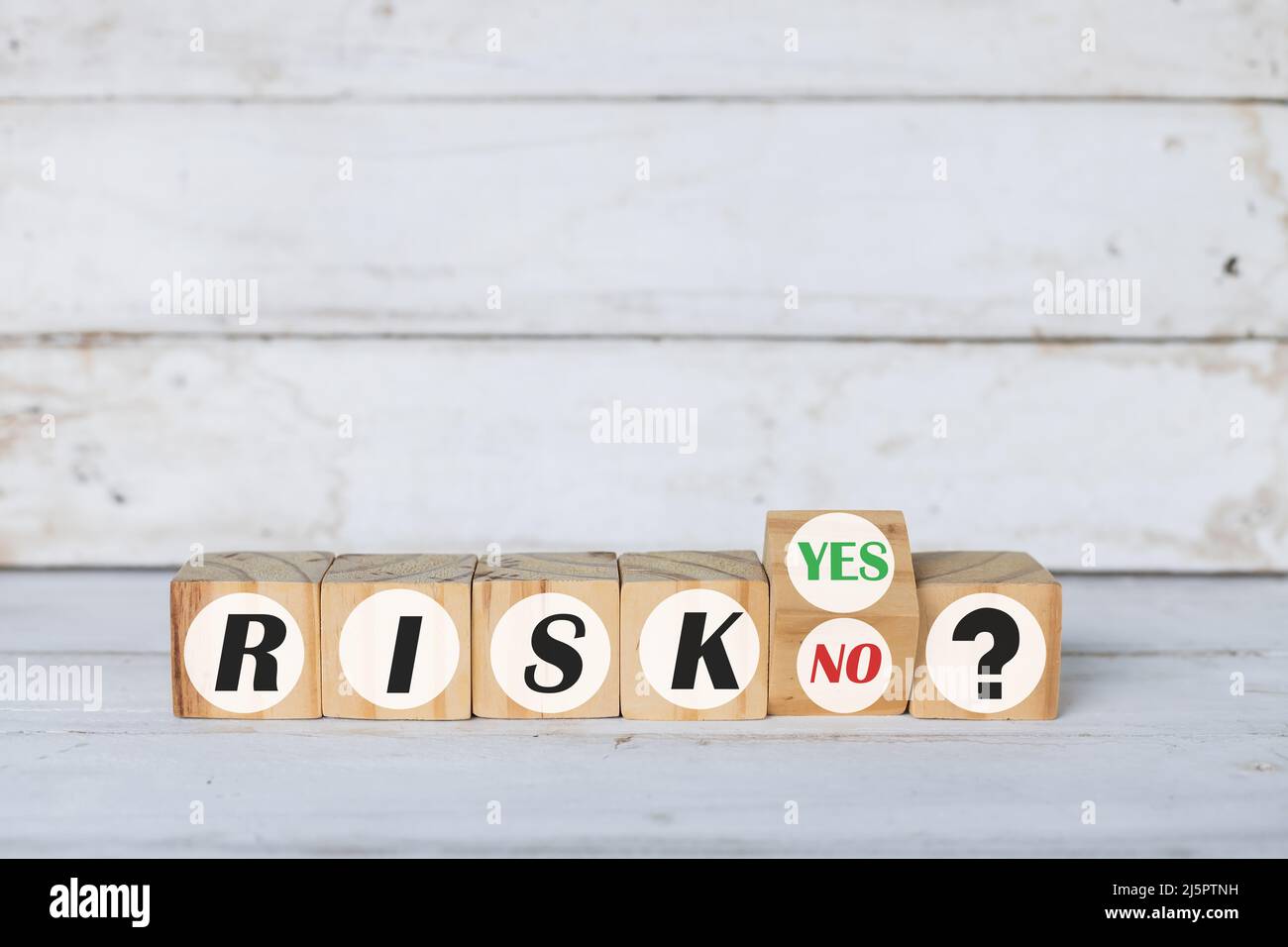 wooden blocks with the words Risk and Rise. Enterprise risk management ...