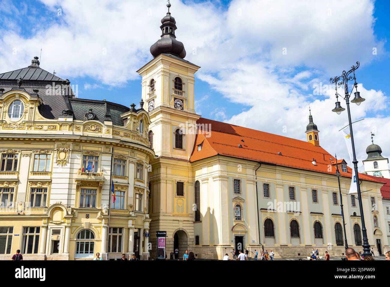 People and tourists wandering on the streets of old town Sibiu, Romania ...