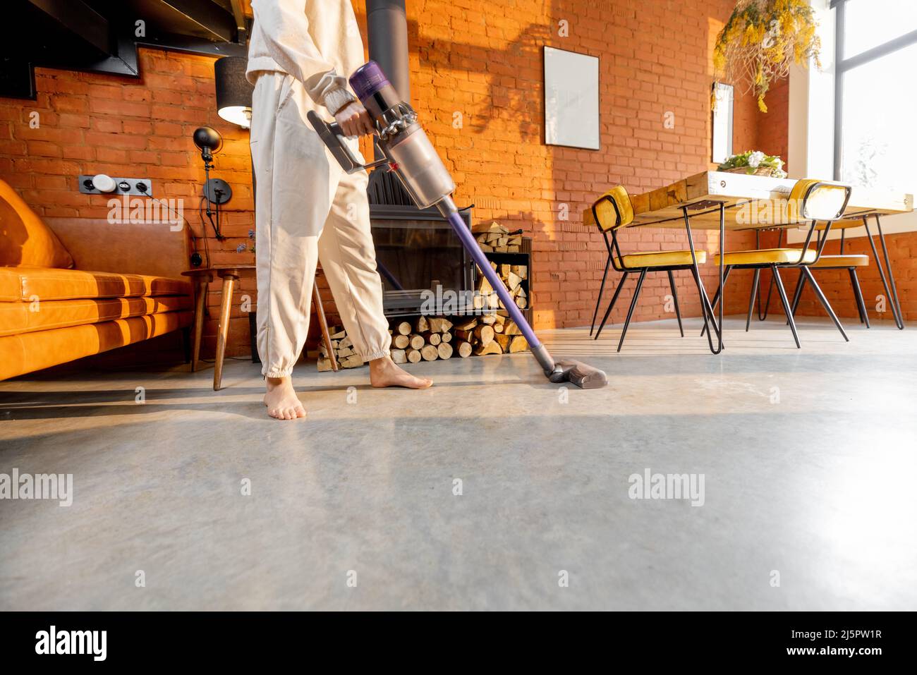 Person cleaning floor vacuum cleaner hi-res stock photography and ...