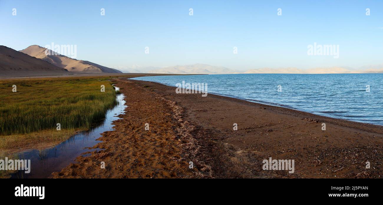 Karakul lake and Pamir range in Tajikistan. Landscape around Pamir ...