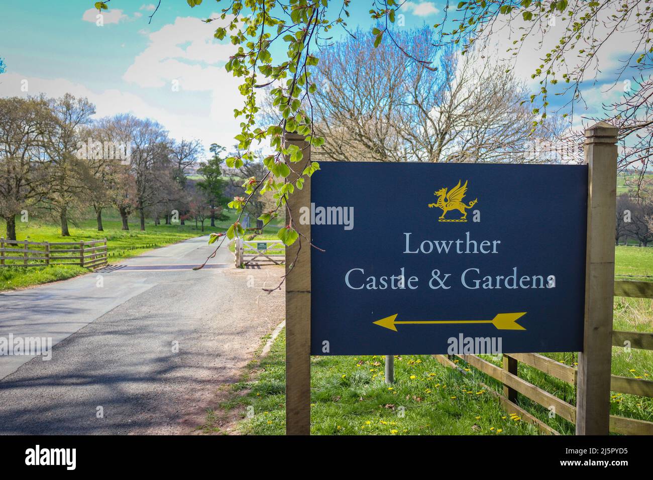 Lowther Castle & Garden Sign, with Road leading in towards the castle ...