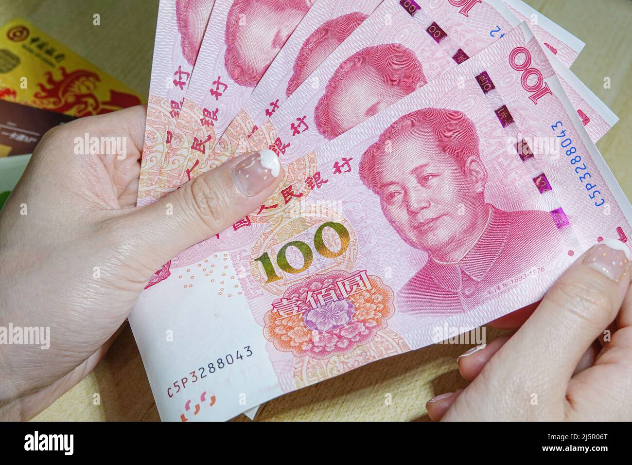In this photo illustration notes of Chinese currency RMB, with some ...
