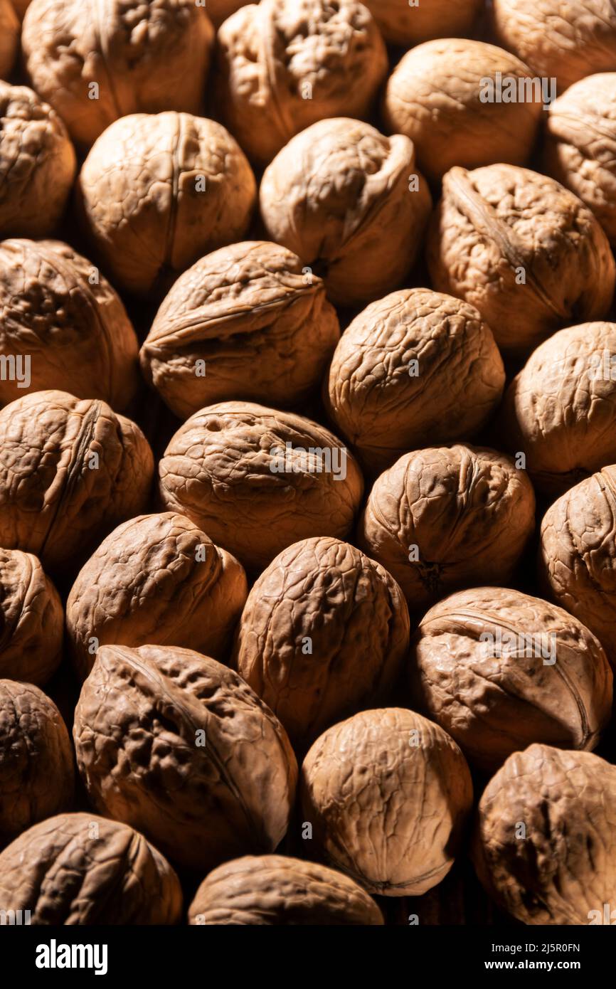 Whole walnuts,close up food background Stock Photo - Alamy