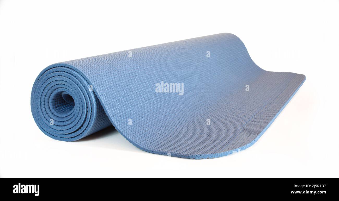 Blue fitness mat isolated on white background. Rolled Yoga rubbery ...