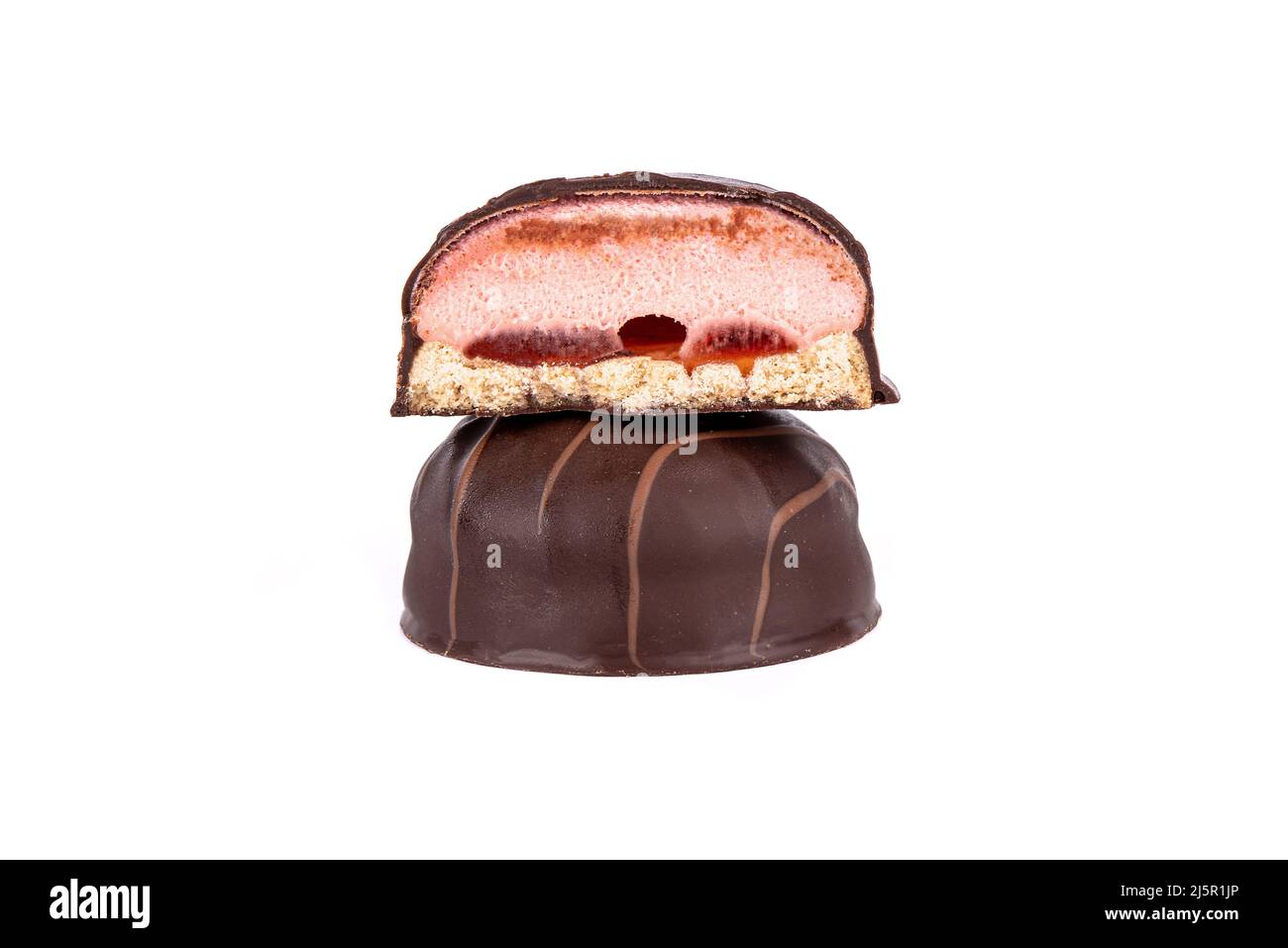 Close-up of a cutaway souffle on a whole souffle over a white ...