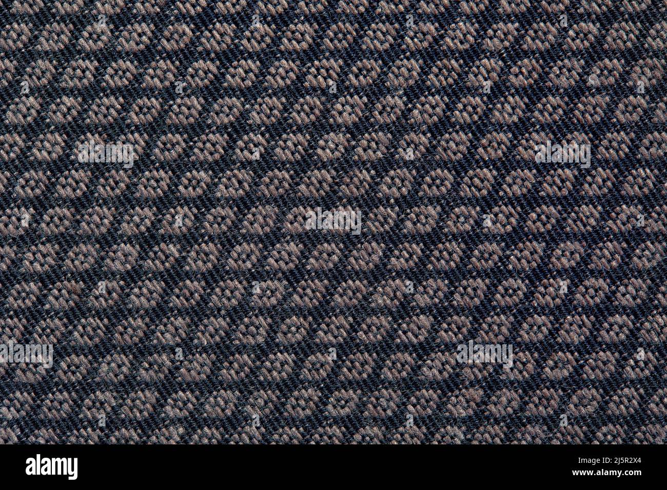 Knitted texture. Texture of jacquard fabric with gray geometric pattern ...
