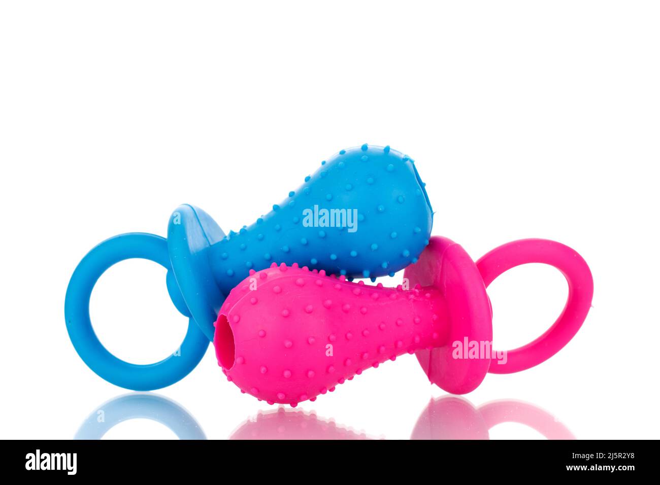 Two rubber toys for dogs, macro, isolated on a white background Stock ...