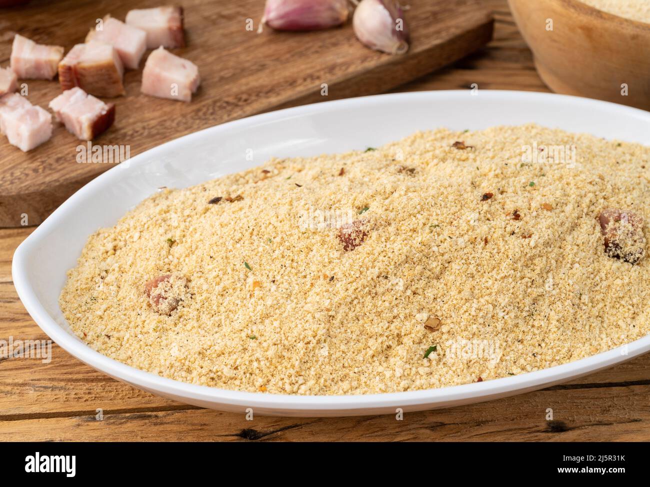 Farofa, typical brazilian manioc flour side dish with seasonings Stock ...