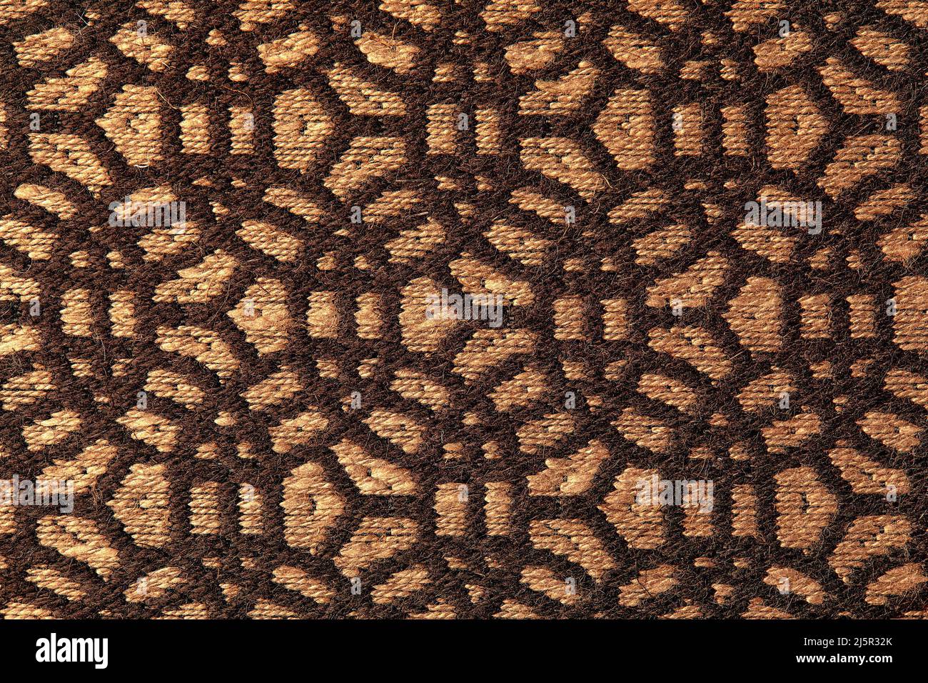 Abstract circular print background on cotton fabric in golden brown ...