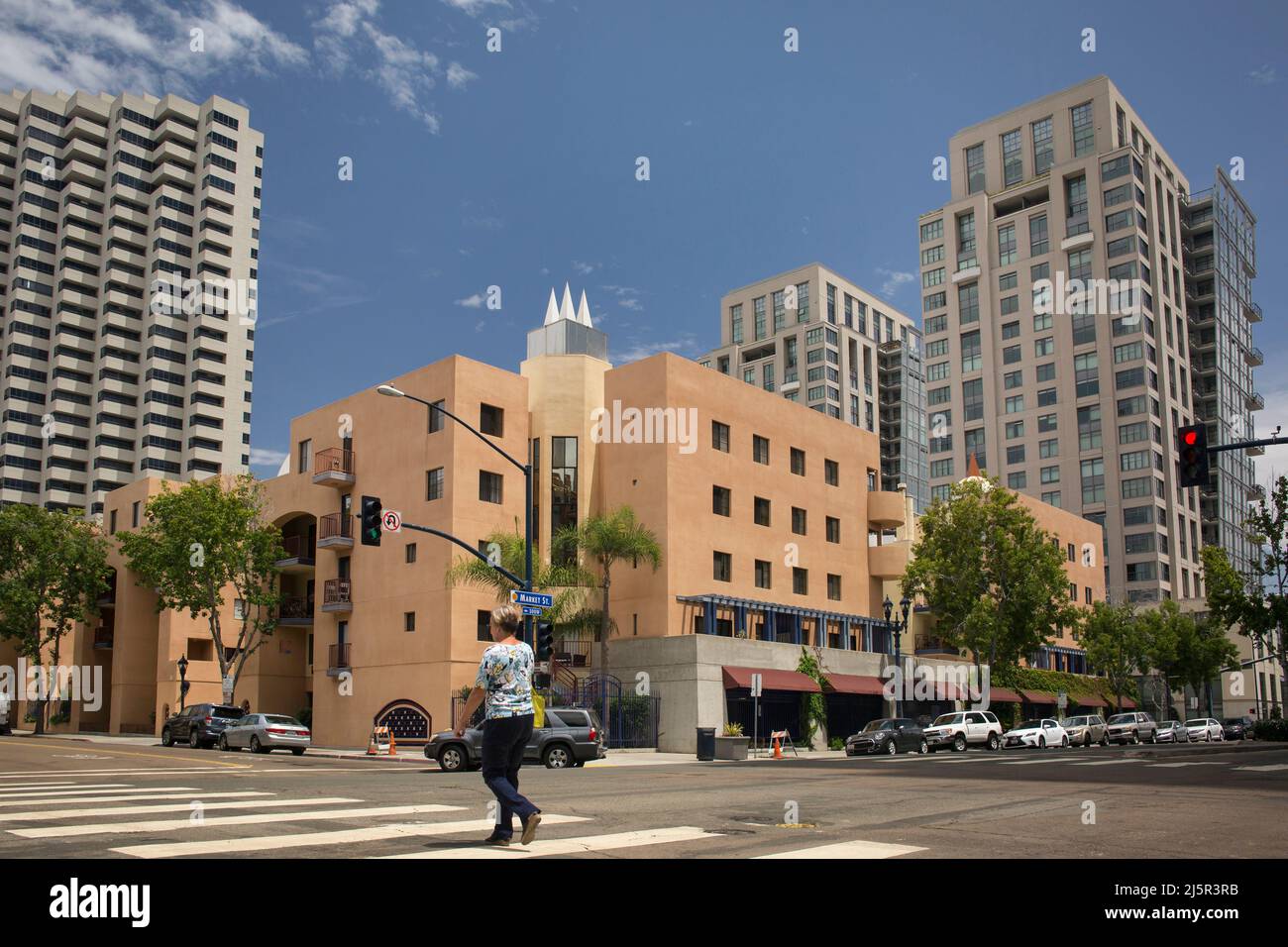 Woman crossing Market St, San Diego Gaslamp Quarter Stock Photo - Alamy