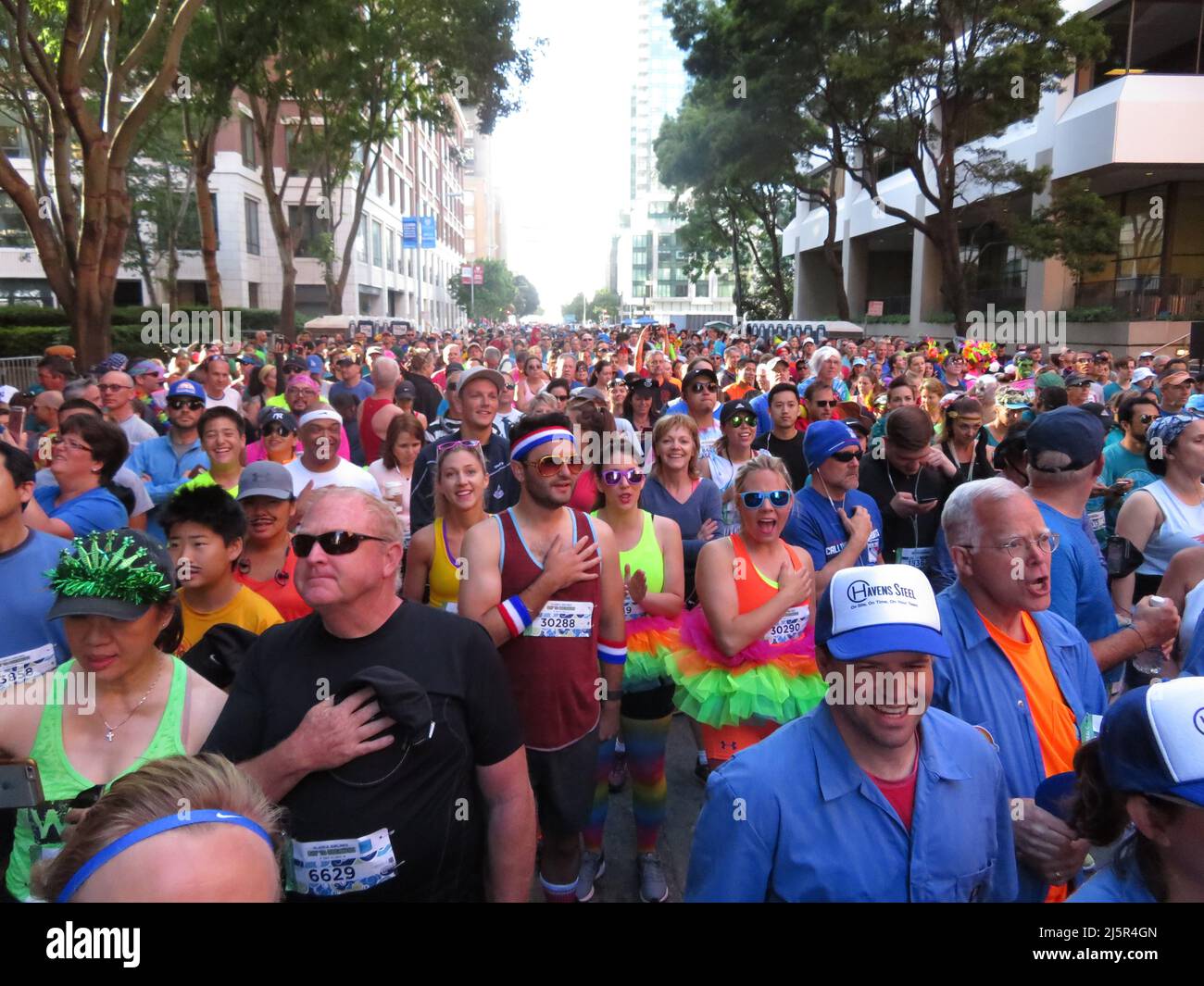USA, San Fransisco - Singing the national anthem at the start of a ...