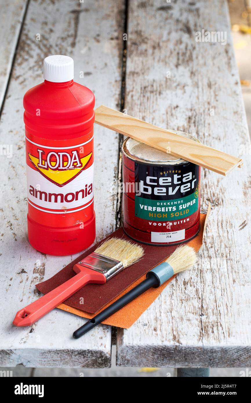 Amonia will degrease the dirt or fat from the wood to be painted Stock ...