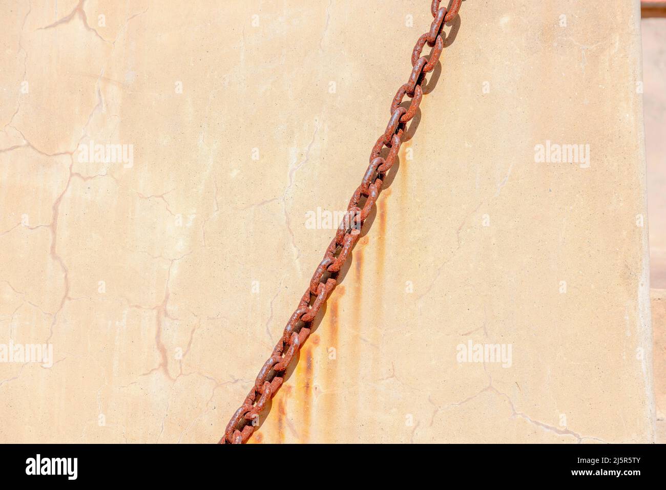 Rusty chains against the wall in San Francisco, California Stock Photo ...