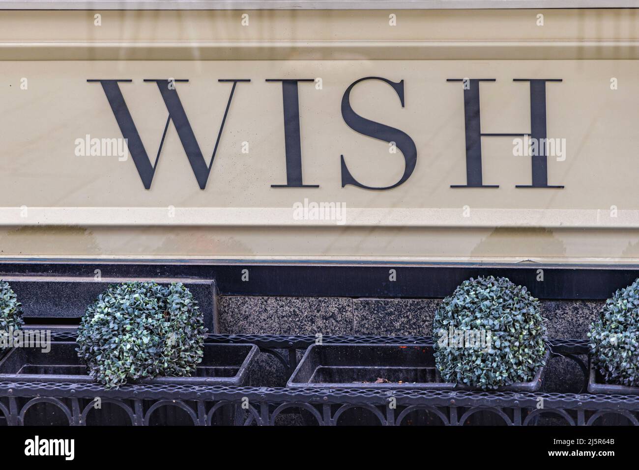 Big Sign Wish at Fashion Shop Front Stock Photo - Alamy