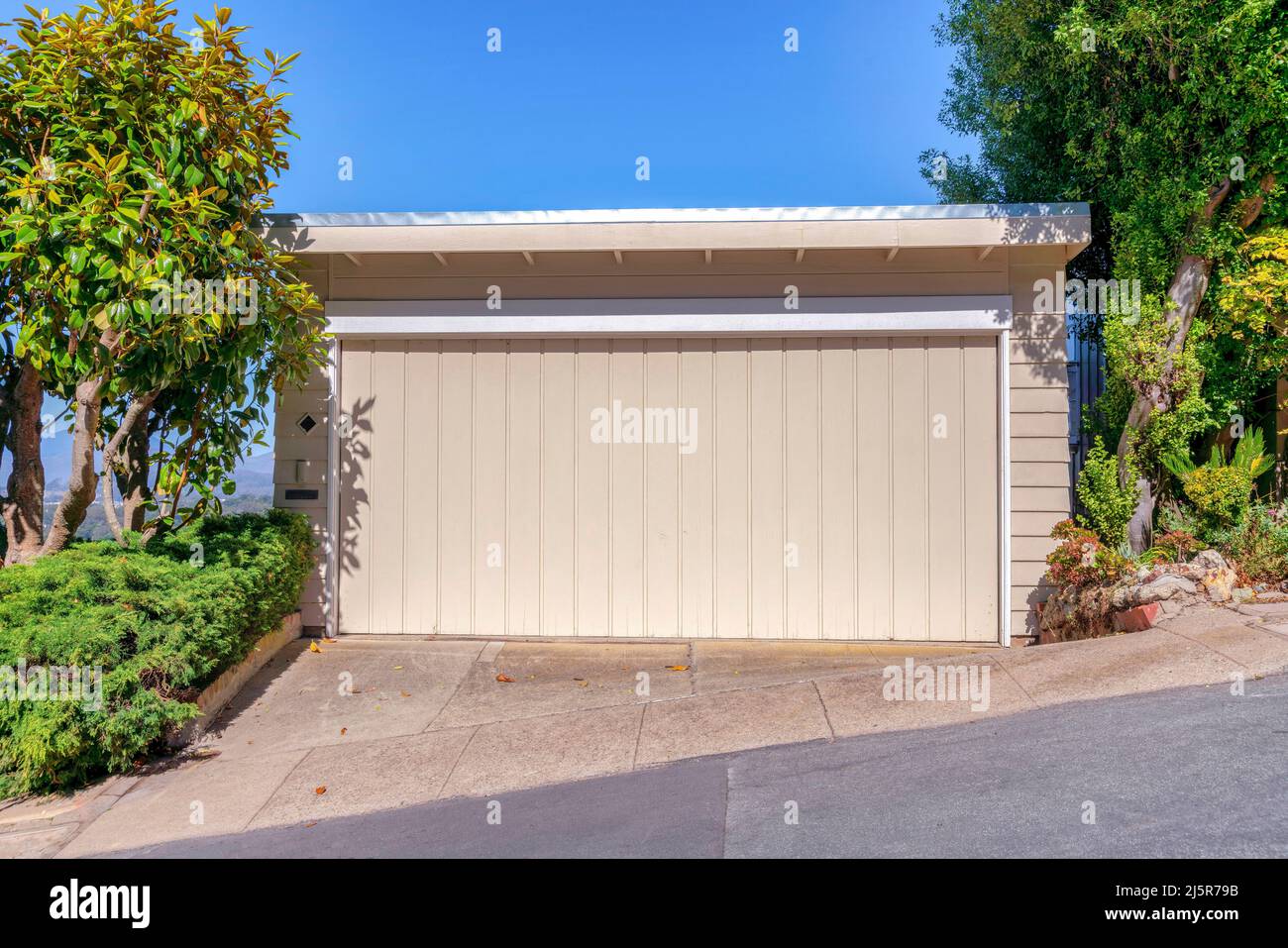 Detached garage exterior with beige vinyl lap sidings at San Francisco ...