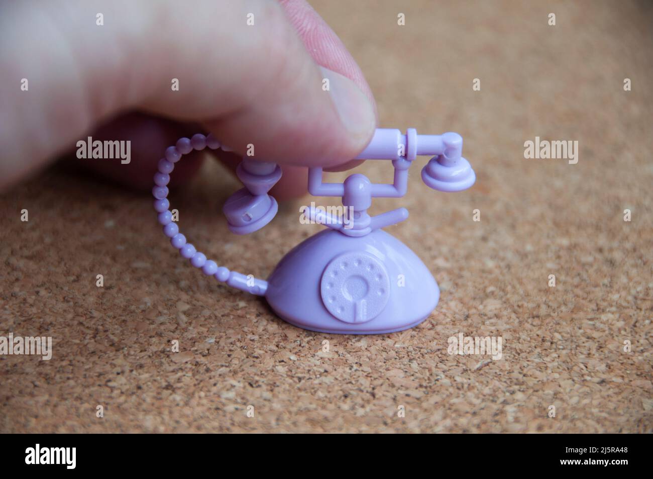 Hand reaching out holding phone hi-res stock photography and images - Alamy