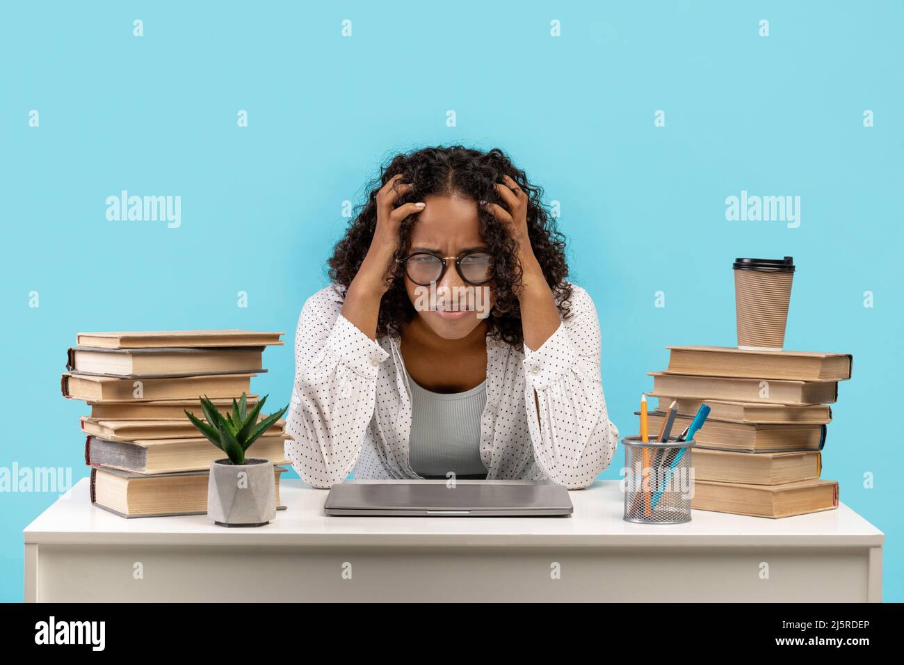 Student stress computer books hi-res stock photography and images - Alamy