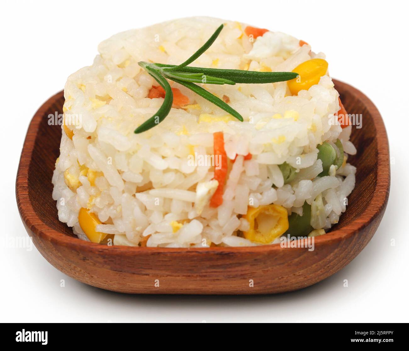 Fried rice with rosemary over white background Stock Photo - Alamy