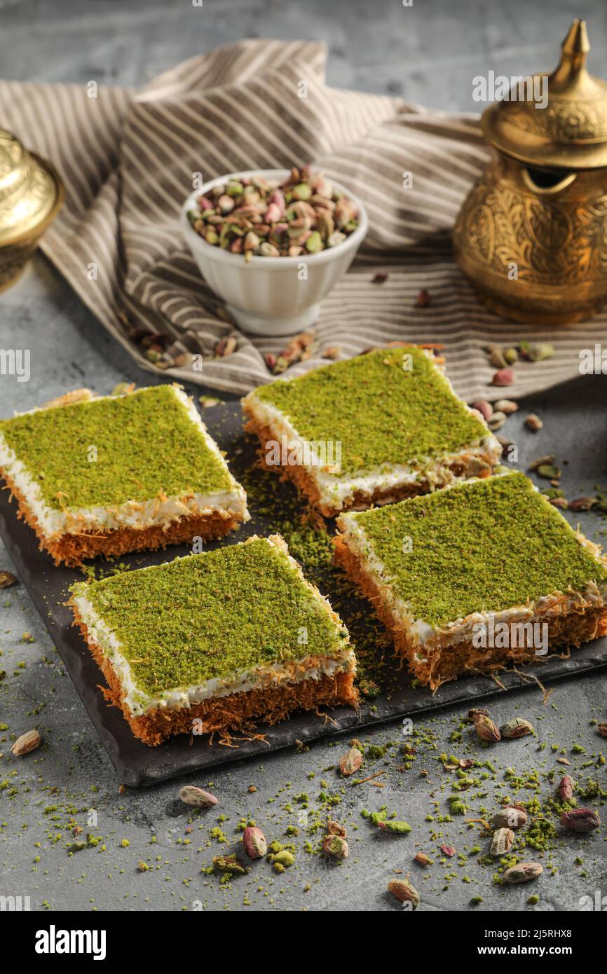 Mediterranean Sweets with cream, pistachio on top Stock Photo - Alamy