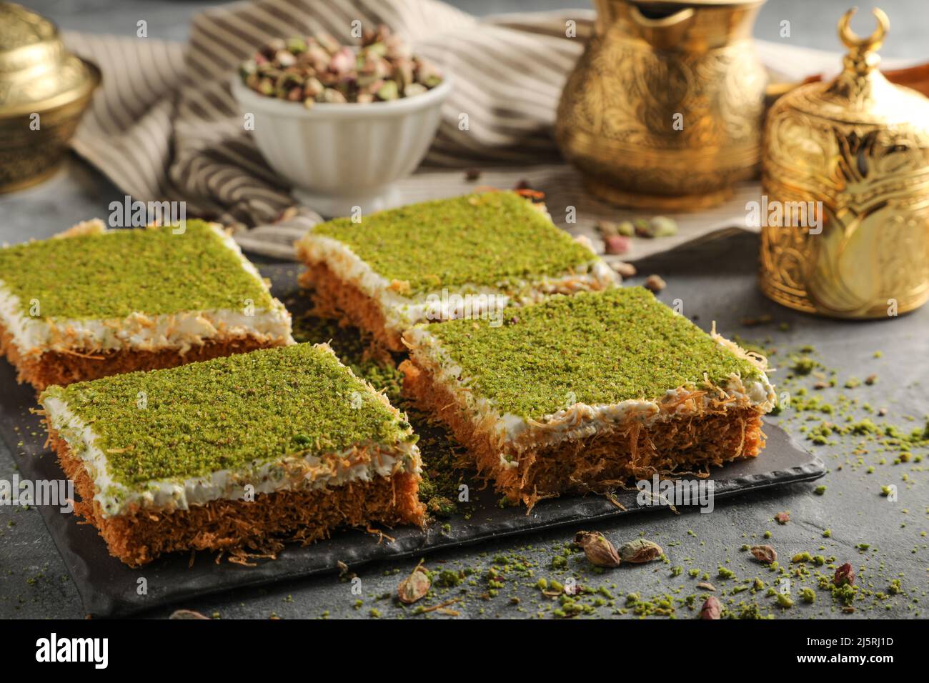 Mediterranean Sweets with cream, pistachio on top Stock Photo - Alamy