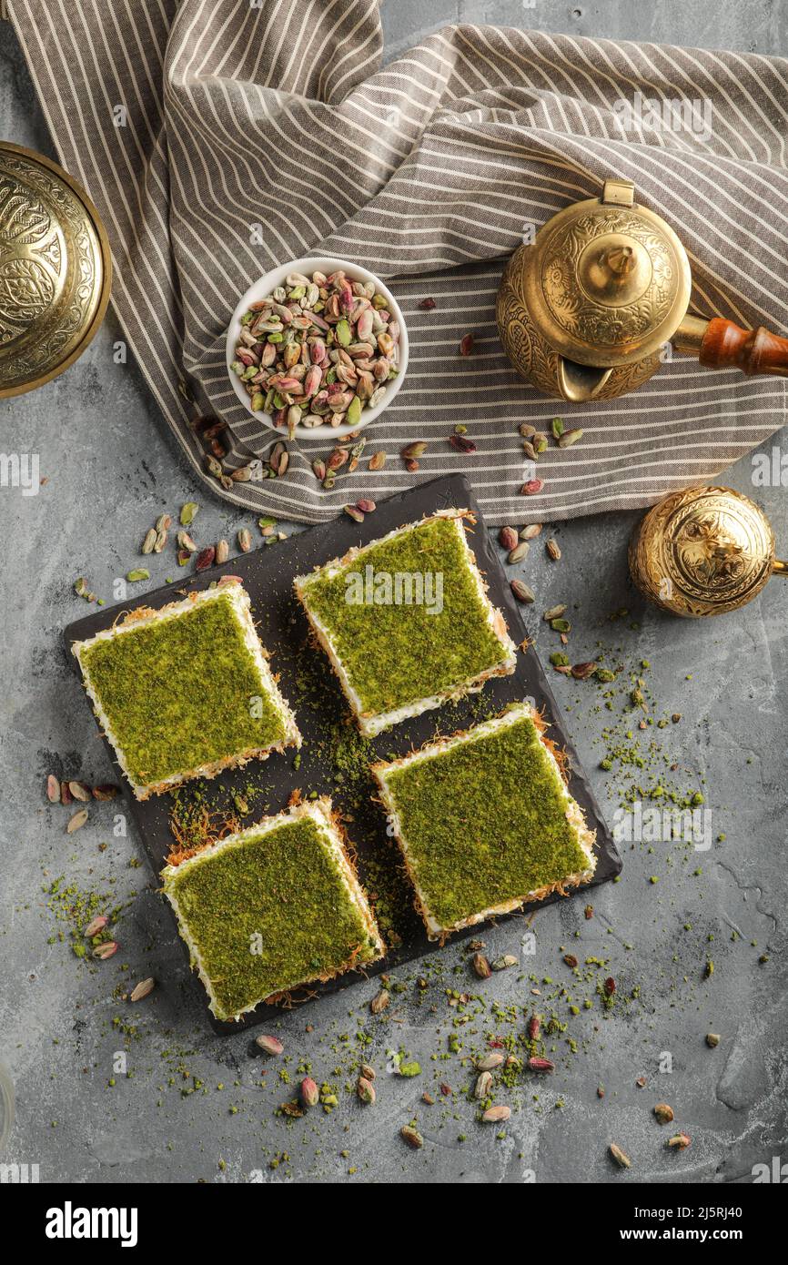 Mediterranean Sweets with cream, pistachio on top Stock Photo - Alamy